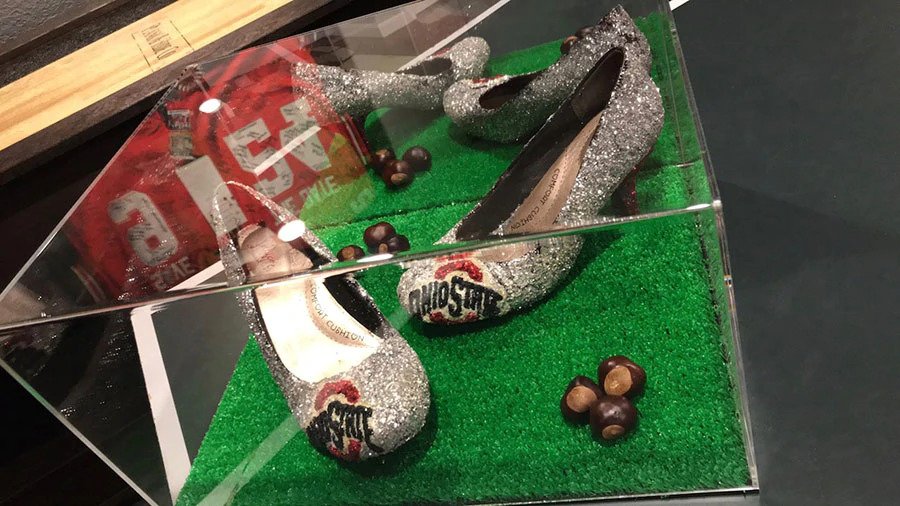 Display Case Holds Handcrafted Shoes Made For a True Buckeye Wedding