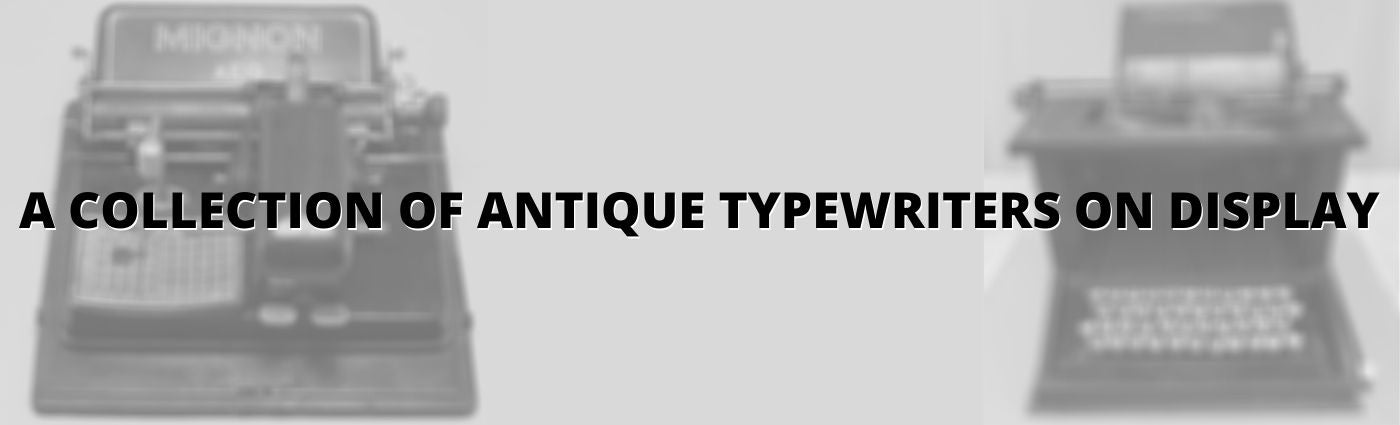 A Collection Of Antique Typewriters On Display